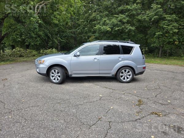 Pelēks Mitsubishi Outlander 2011 Rīga, ar dzinēja tilpumu 2.20 L un nobraukumu 330 tūkst. km par 4200 €, foto 10 vietnē AUTOMOTO.COM.LV