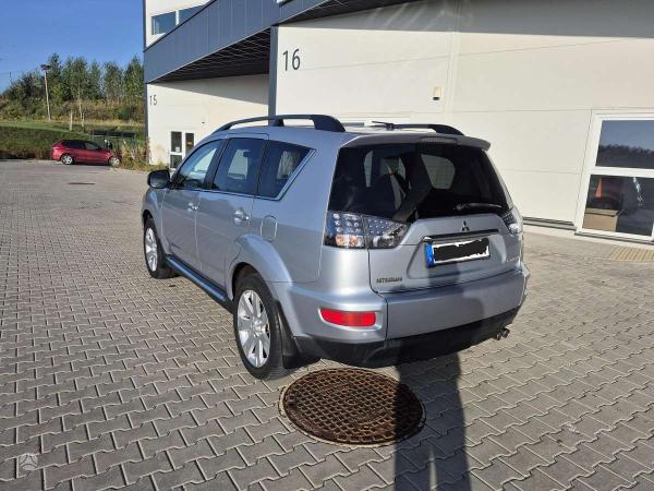 Pelēks Mitsubishi Outlander 2011 Viļņa, ar dzinēja tilpumu 2.18 L un nobraukumu 220 tūkst. km par 5500 €, foto 4 vietnē AUTOMOTO.COM.LV