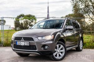 Pelēks Mitsubishi Outlander 2011 Rīga, ar dzinēja tilpumu 2.20 L un nobraukumu 280 tūkst. km par 4990 €, foto  vietnē AUTOMOTO.COM.LV