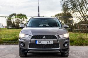Pelēks Mitsubishi Outlander 2011 Rīga, ar dzinēja tilpumu 2.20 L un nobraukumu 280 tūkst. km par 4990 €, foto 4 vietnē AUTOMOTO.COM.LV