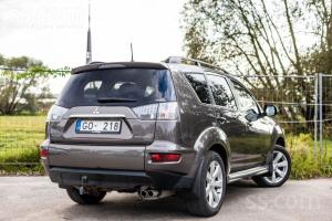 Pelēks Mitsubishi Outlander 2011 Rīga, ar dzinēja tilpumu 2.20 L un nobraukumu 280 tūkst. km par 4990 €, foto 8 vietnē AUTOMOTO.COM.LV