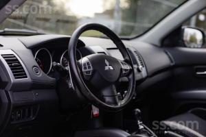 Pelēks Mitsubishi Outlander 2011 Rīga, ar dzinēja tilpumu 2.20 L un nobraukumu 280 tūkst. km par 4990 €, foto 13 vietnē AUTOMOTO.COM.LV