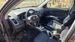 Pelēks Mitsubishi Outlander 2012 Tartu, ar dzinēja tilpumu 2.40 L un nobraukumu 231 tūkst. km par 2950 €, foto 9 vietnē AUTOMOTO.COM.LV