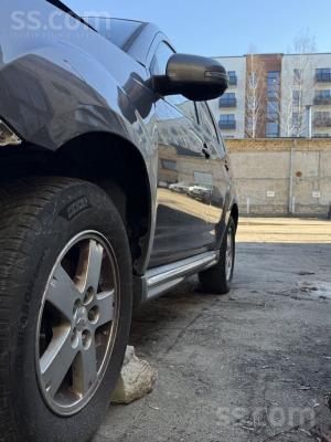 Pelēks Mitsubishi Outlander 2012 Rīga, ar dzinēja tilpumu 2.30 L un nobraukumu 270 tūkst. km par 1800 €, foto  vietnē AUTOMOTO.COM.LV