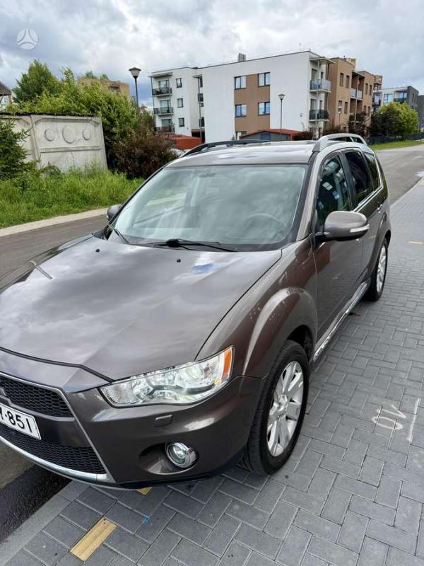 Pelēks Mitsubishi Outlander 2012 Kauņa, ar dzinēja tilpumu 2.18 L un nobraukumu 270 tūkst. km par 4900 €, foto 2 vietnē AUTOMOTO.COM.LV
