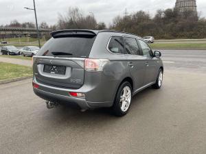 Grey Mitsubishi Outlander 2013 in Kaunas, with an engine capacity of 2.00 L and mileage of 270 thousand km for 5950 €, photo 11 on AUTOMOTO.COM.LV