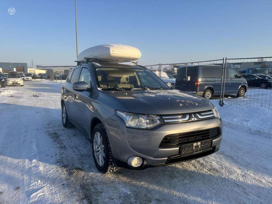 Pelēks Mitsubishi Outlander 2013 Marijampole, ar dzinēja tilpumu 2.30 L un nobraukumu 260 tūkst. km par 4950 €, foto 3 vietnē AUTOMOTO.COM.LV