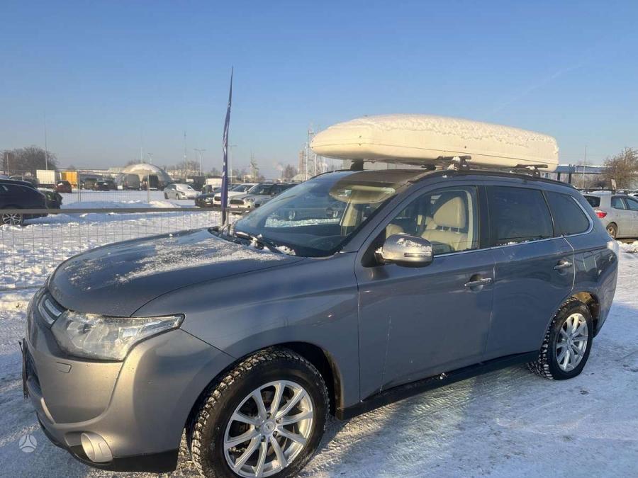 Pelēks Mitsubishi Outlander 2013 Marijampole, ar dzinēja tilpumu 2.30 L un nobraukumu 260 tūkst. km par 4950 €, foto 7 vietnē AUTOMOTO.COM.LV