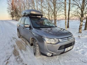 Grey Mitsubishi Outlander 2013 in Riga, with an engine capacity of 2.20 L and mileage of 260 thousand km for 8200 €, photo 2 on AUTOMOTO.COM.LV