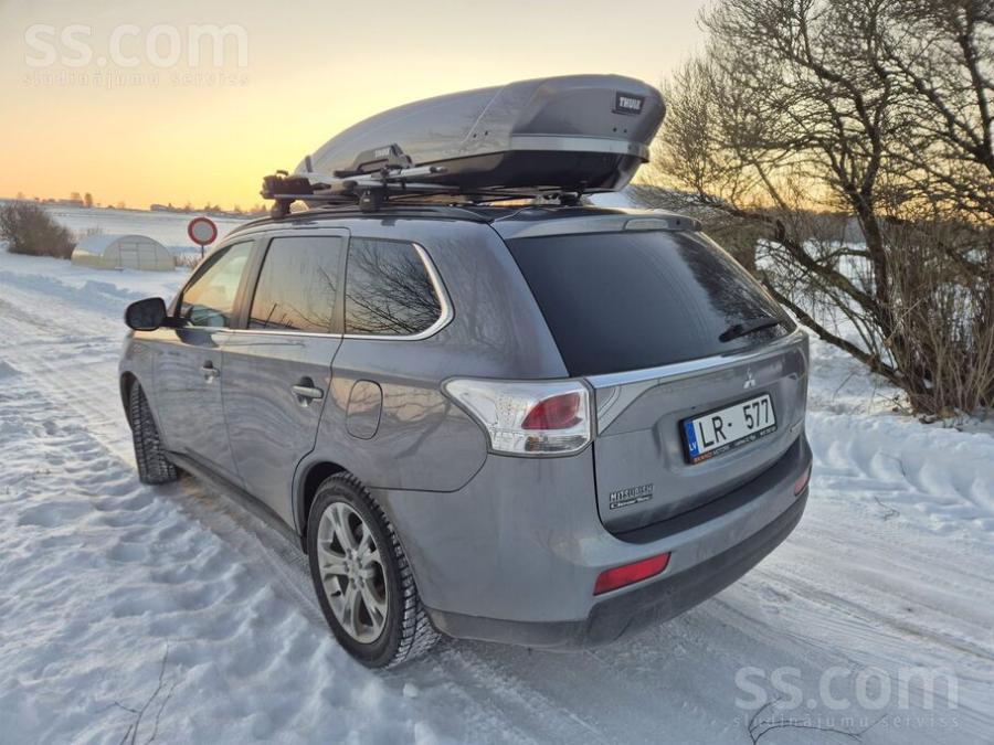 Grey Mitsubishi Outlander 2013 in Riga, with an engine capacity of 2.20 L and mileage of 260 thousand km for 8200 €, photo 3 on AUTOMOTO.COM.LV