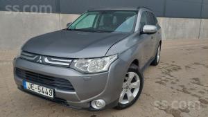 Pelēks Mitsubishi Outlander 2013 Rīga, ar dzinēja tilpumu 2.00 L un nobraukumu 290 tūkst. km par 5590 €, foto 3 vietnē AUTOMOTO.COM.LV
