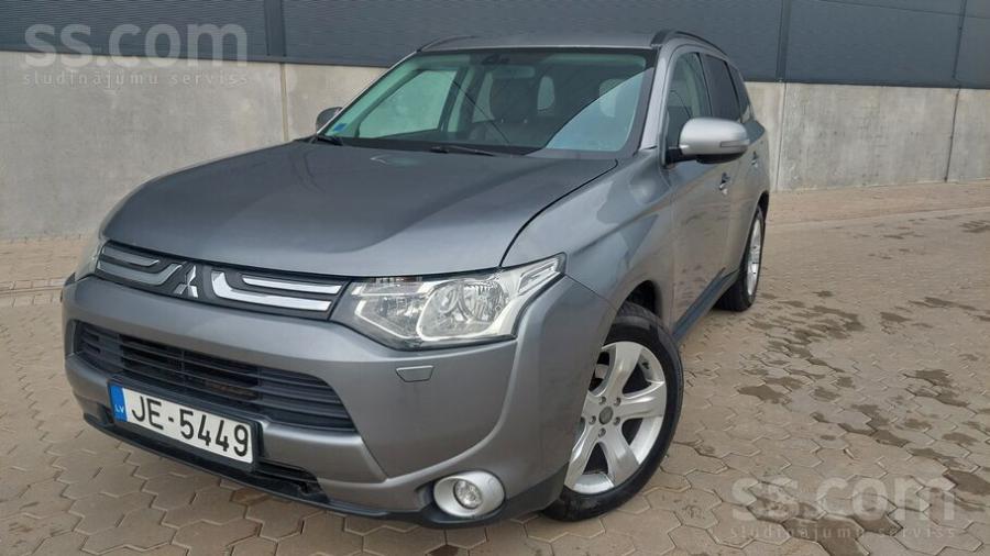 Pelēks Mitsubishi Outlander 2013 Rīga, ar dzinēja tilpumu 2.00 L un nobraukumu 290 tūkst. km par 5590 €, foto 3 vietnē AUTOMOTO.COM.LV