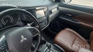 Pelēks Mitsubishi Outlander 2013 Rīga, ar dzinēja tilpumu 2.00 L un nobraukumu 290 tūkst. km par 5590 €, foto 4 vietnē AUTOMOTO.COM.LV