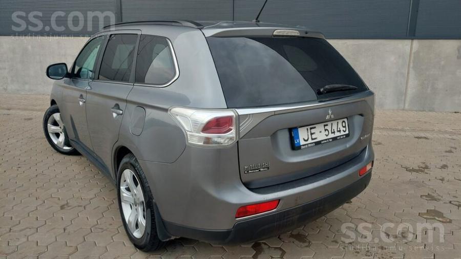 Pelēks Mitsubishi Outlander 2013 Rīga, ar dzinēja tilpumu 2.00 L un nobraukumu 290 tūkst. km par 5590 €, foto 7 vietnē AUTOMOTO.COM.LV