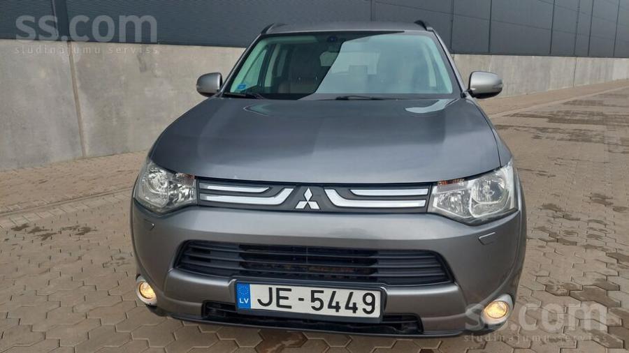 Pelēks Mitsubishi Outlander 2013 Rīga, ar dzinēja tilpumu 2.00 L un nobraukumu 290 tūkst. km par 5590 €, foto 14 vietnē AUTOMOTO.COM.LV