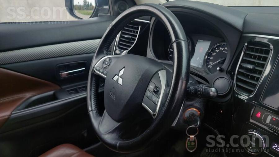Pelēks Mitsubishi Outlander 2013 Rīga, ar dzinēja tilpumu 2.00 L un nobraukumu 290 tūkst. km par 5590 €, foto 16 vietnē AUTOMOTO.COM.LV