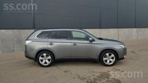 Pelēks Mitsubishi Outlander 2013 Rīga, ar dzinēja tilpumu 2.00 L un nobraukumu 290 tūkst. km par 5590 €, foto 26 vietnē AUTOMOTO.COM.LV