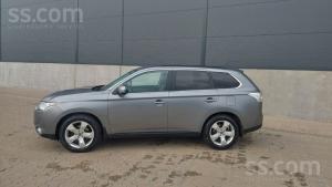 Pelēks Mitsubishi Outlander 2013 Rīga, ar dzinēja tilpumu 2.00 L un nobraukumu 290 tūkst. km par 5590 €, foto 27 vietnē AUTOMOTO.COM.LV