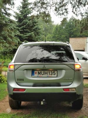 Pelēks Mitsubishi Outlander 2013 Šauļi, ar dzinēja tilpumu 2.20 L un nobraukumu 198 tūkst. km par 5499 €, foto 25 vietnē AUTOMOTO.COM.LV