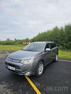 Grey Mitsubishi Outlander 2013 in Riga, with an engine capacity of 2.20 L and mileage of 263 thousand km for 6500 €, photo 3 on AUTOMOTO.COM.LV