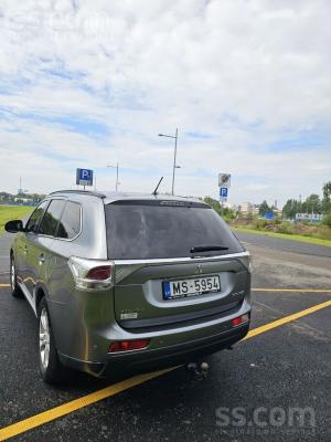 Grey Mitsubishi Outlander 2013 in Riga, with an engine capacity of 2.20 L and mileage of 263 thousand km for 6500 €, photo 9 on AUTOMOTO.COM.LV