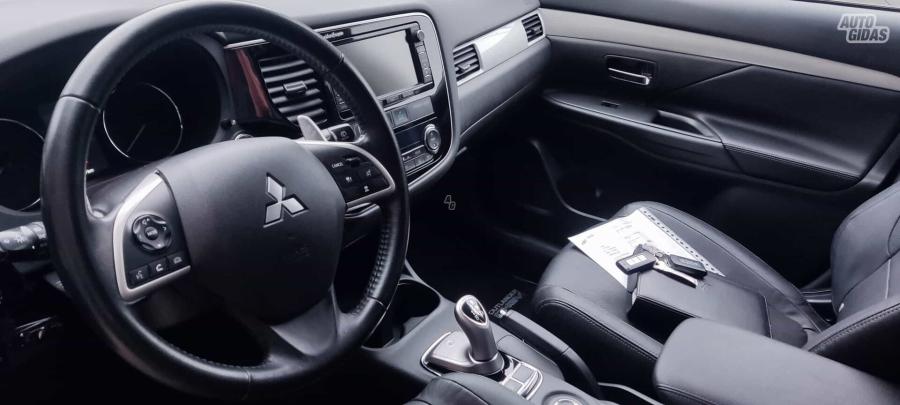 Pelēks Mitsubishi Outlander 2014 Kauņa, ar dzinēja tilpumu 2.00 L un nobraukumu 240 tūkst. km par 8500 €, foto 23 vietnē AUTOMOTO.COM.LV