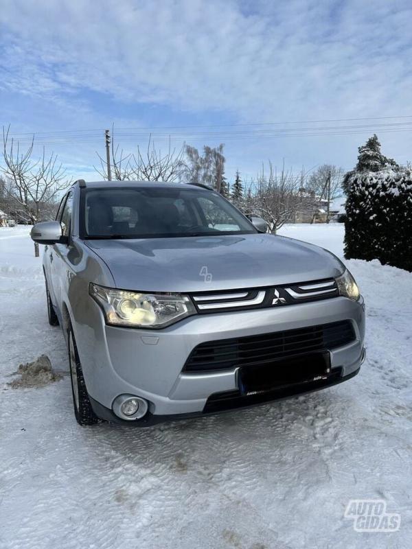 Pelēks Mitsubishi Outlander 2014 Panevēža, ar dzinēja tilpumu 2.30 L un nobraukumu 240 tūkst. km par 7900 €, foto 1 vietnē AUTOMOTO.COM.LV