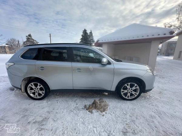 Grey Mitsubishi Outlander 2014 in Panevezys, with an engine capacity of 2.30 L and mileage of 240 thousand km for 7900 €, photo 2 on AUTOMOTO.COM.LV