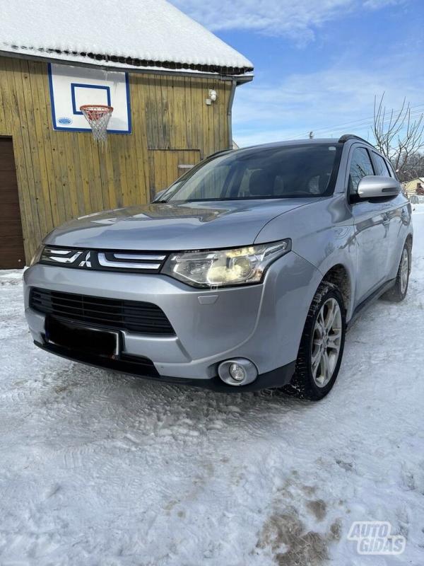 Grey Mitsubishi Outlander 2014 in Panevezys, with an engine capacity of 2.30 L and mileage of 240 thousand km for 7900 €, photo 4 on AUTOMOTO.COM.LV