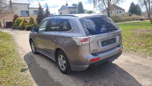 Pelēks Mitsubishi Outlander 2014 Viļņa, ar dzinēja tilpumu 2.20 L un nobraukumu 245 tūkst. km par 6500 €, foto 20 vietnē AUTOMOTO.COM.LV