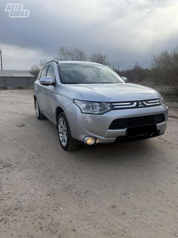 Pelēks Mitsubishi Outlander 2014 Panevēža, ar dzinēja tilpumu 2.20 L un nobraukumu 243 tūkst. km par 7700 €, foto 2 vietnē AUTOMOTO.COM.LV