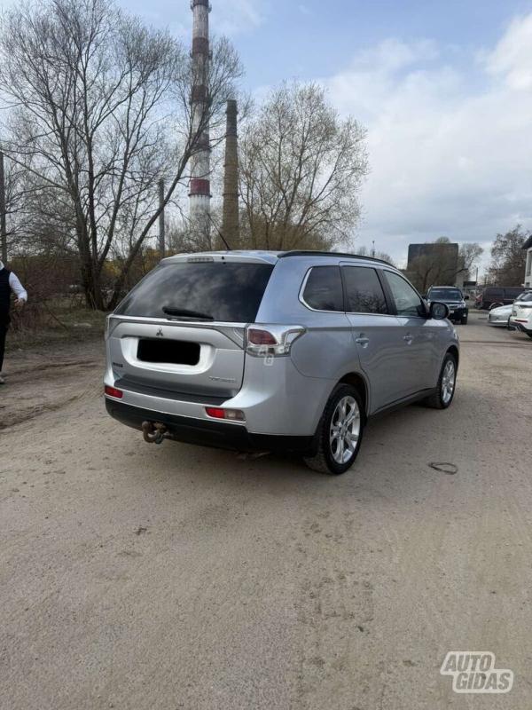 Pelēks Mitsubishi Outlander 2014 Panevēža, ar dzinēja tilpumu 2.20 L un nobraukumu 243 tūkst. km par 7700 €, foto 3 vietnē AUTOMOTO.COM.LV