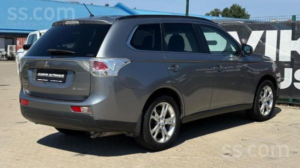 Pelēks Mitsubishi Outlander 2014 Liepāja, ar dzinēja tilpumu 2.00 L un nobraukumu 173 tūkst. km par 9350 €, foto 4 vietnē AUTOMOTO.COM.LV