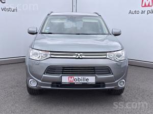 Pelēks Mitsubishi Outlander 2014 Rīga, ar dzinēja tilpumu 2.00 L un nobraukumu 267 tūkst. km par 8950 €, foto 3 vietnē AUTOMOTO.COM.LV