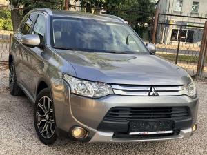 Grey Mitsubishi Outlander 2014 in Ukmerge, with an engine capacity of 2.27 L and mileage of 270 thousand km for 7350 €, photo 3 on AUTOMOTO.COM.LV