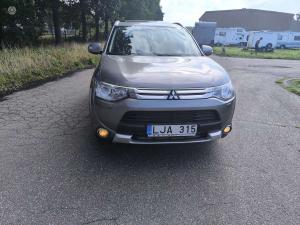 Pelēks Mitsubishi Outlander 2014 Marijampole, ar dzinēja tilpumu 2.27 L un nobraukumu 211 tūkst. km par 7900 €, foto 3 vietnē AUTOMOTO.COM.LV