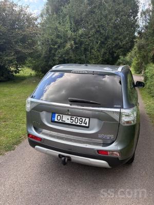 Pelēks Mitsubishi Outlander 2014 Liepāja, ar dzinēja tilpumu 2.00 L un nobraukumu 216 tūkst. km par 9000 €, foto 5 vietnē AUTOMOTO.COM.LV