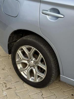 Grey Mitsubishi Outlander 2014 in Vilnius, with an engine capacity of 2.00 L and mileage of 118 thousand km for 11900 €, photo 26 on AUTOMOTO.COM.LV