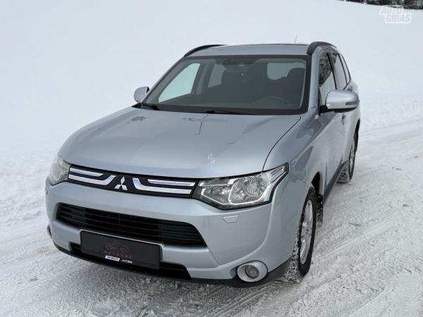 Pelēks Mitsubishi Outlander 2015 Viļņa, ar dzinēja tilpumu 2.00 L un nobraukumu 204 tūkst. km par 8800 €, foto 2 vietnē AUTOMOTO.COM.LV