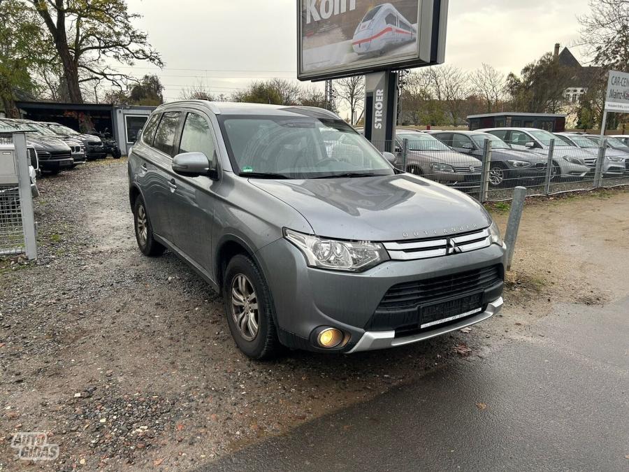 Grey Mitsubishi Outlander 2015 in Panevezys, with an engine capacity of 2.30 L and mileage of 238 thousand km for 4900 €, photo 1 on AUTOMOTO.COM.LV
