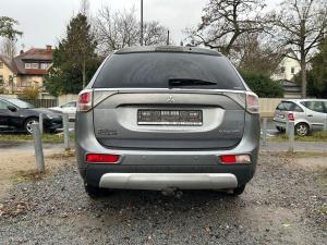 Grey Mitsubishi Outlander 2015 in Panevezys, with an engine capacity of 2.30 L and mileage of 238 thousand km for 4900 €, photo 4 on AUTOMOTO.COM.LV