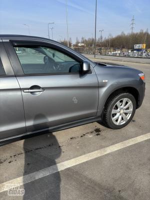 Grey Mitsubishi Outlander 2015 in Kaunas, with an engine capacity of 2.00 L and mileage of 159 thousand km for 5300 €, photo 14 on AUTOMOTO.COM.LV
