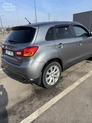 Grey Mitsubishi Outlander 2015 in Kaunas, with an engine capacity of 2.00 L and mileage of 159 thousand km for 5300 €, photo 15 on AUTOMOTO.COM.LV