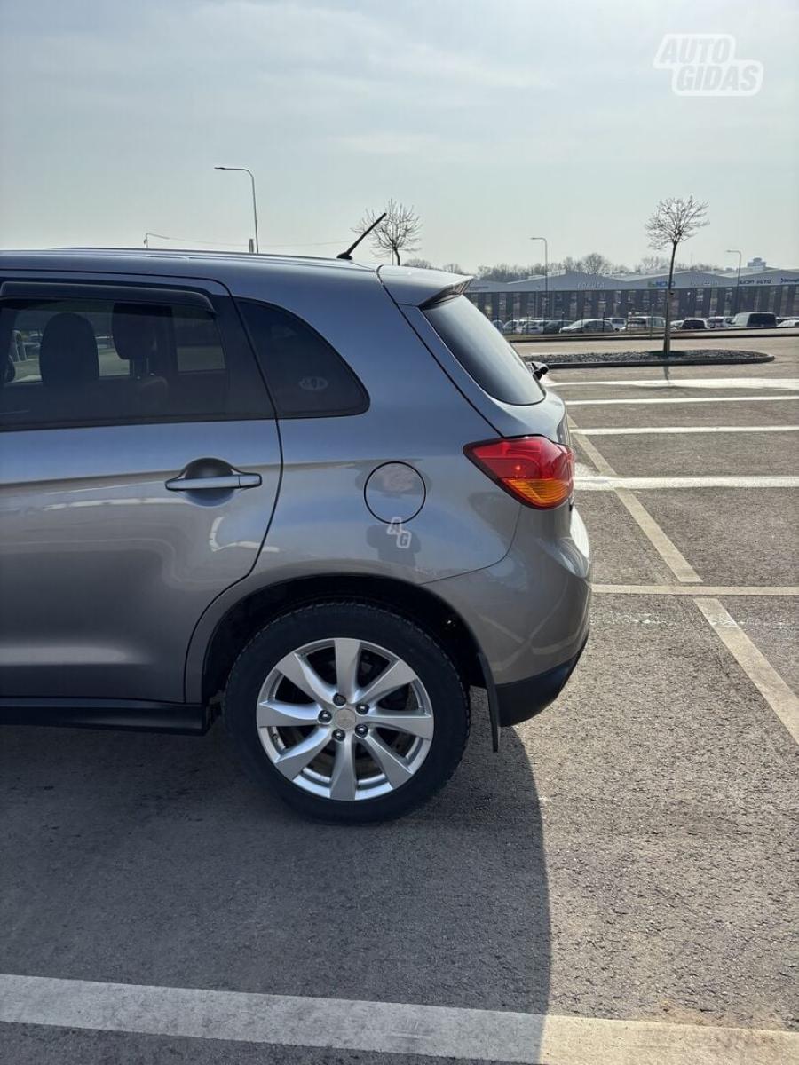 Grey Mitsubishi Outlander 2015 in Kaunas, with an engine capacity of 2.00 L and mileage of 159 thousand km for 5300 €, photo 17 on AUTOMOTO.COM.LV