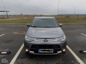Pelēks Mitsubishi Outlander 2015 Marijampole, ar dzinēja tilpumu 2.00 L un nobraukumu 293 tūkst. km par 9500 €, foto  vietnē AUTOMOTO.COM.LV