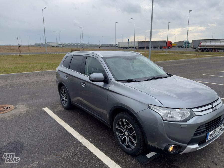 Grey Mitsubishi Outlander 2015 in Marijampole, with an engine capacity of 2.00 L and mileage of 293 thousand km for 9500 €, photo 3 on AUTOMOTO.COM.LV