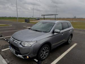 Grey Mitsubishi Outlander 2015 in Marijampole, with an engine capacity of 2.00 L and mileage of 293 thousand km for 9500 €, photo 7 on AUTOMOTO.COM.LV