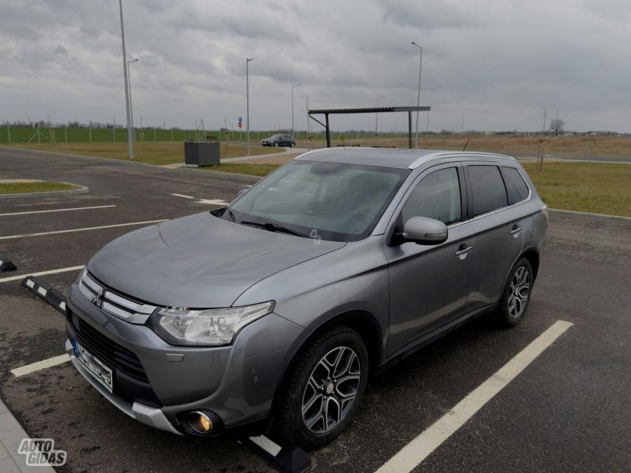 Grey Mitsubishi Outlander 2015 in Marijampole, with an engine capacity of 2.00 L and mileage of 293 thousand km for 9500 €, photo 7 on AUTOMOTO.COM.LV