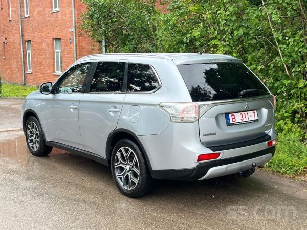 Pelēks Mitsubishi Outlander 2015 Rīga, ar dzinēja tilpumu 2.30 L un nobraukumu 0 tūkst. km par 5790 €, foto 3 vietnē AUTOMOTO.COM.LV