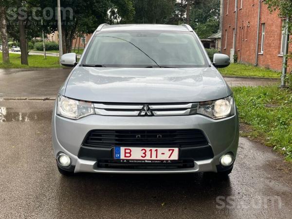 Pelēks Mitsubishi Outlander 2015 Rīga, ar dzinēja tilpumu 2.30 L un nobraukumu 0 tūkst. km par 5790 €, foto 8 vietnē AUTOMOTO.COM.LV